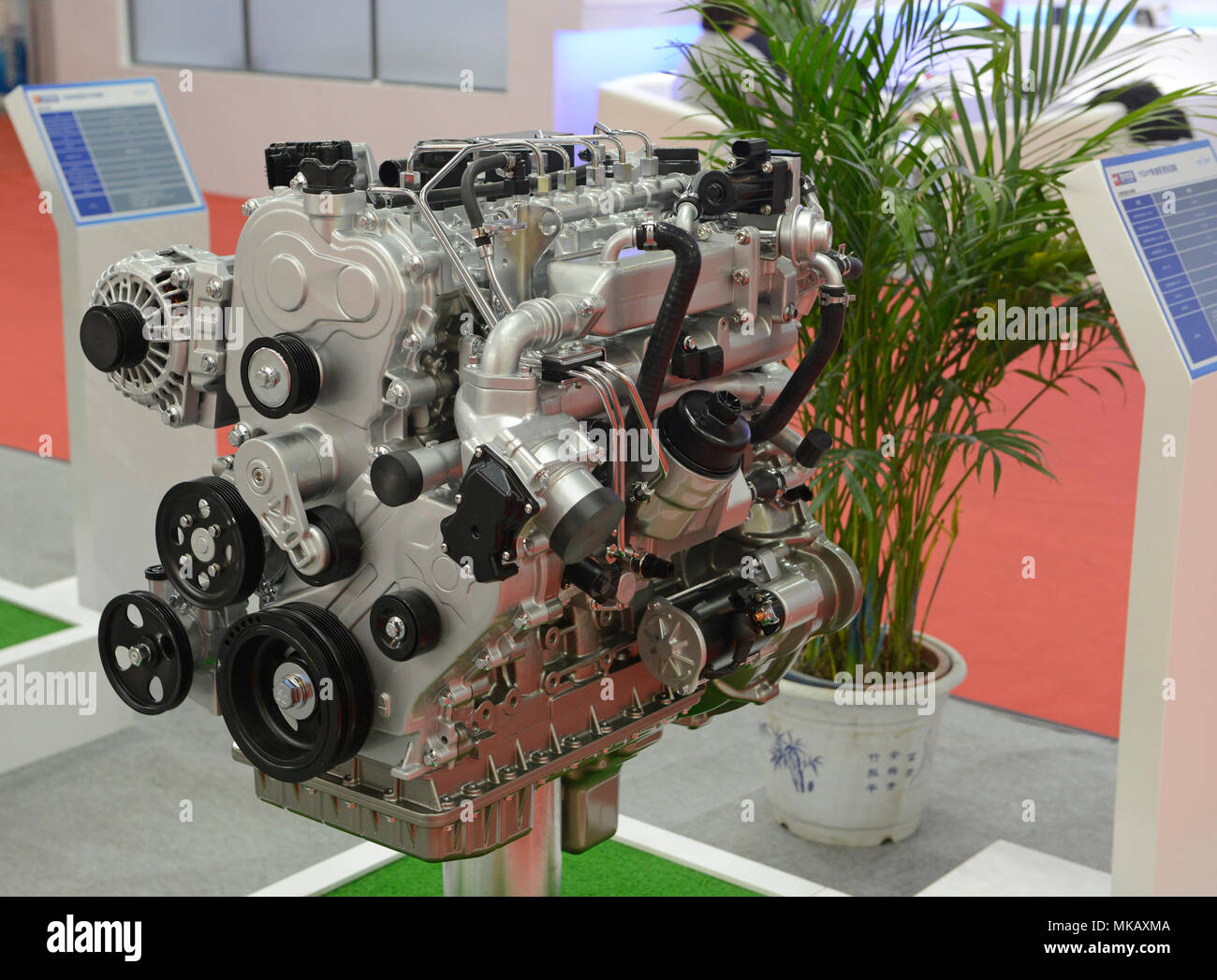 A gas-fueled engine on display at the Auto China 2018 motorshow in ...
