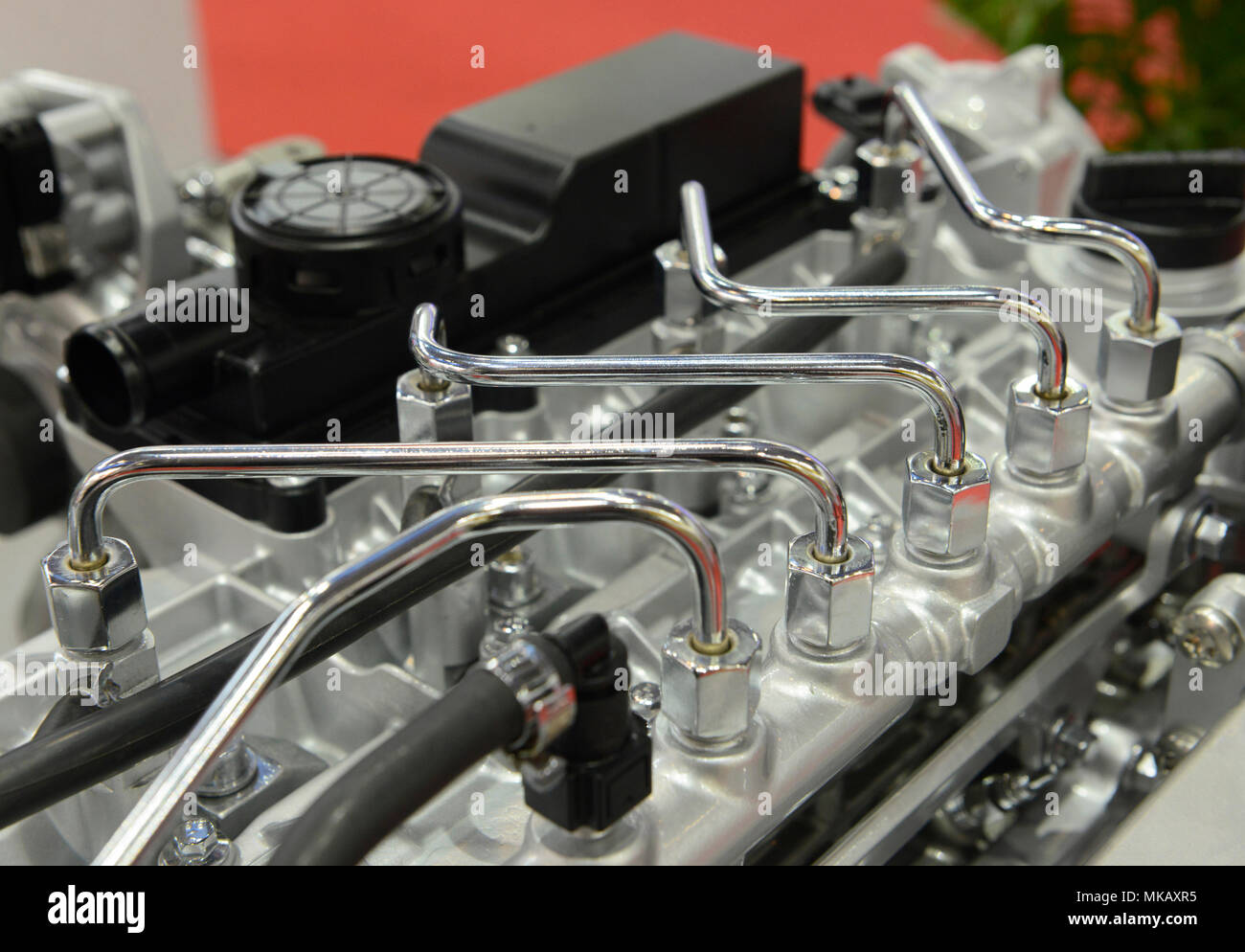 Close up of the top of a gas-fueled engine on display at the Auto China ...