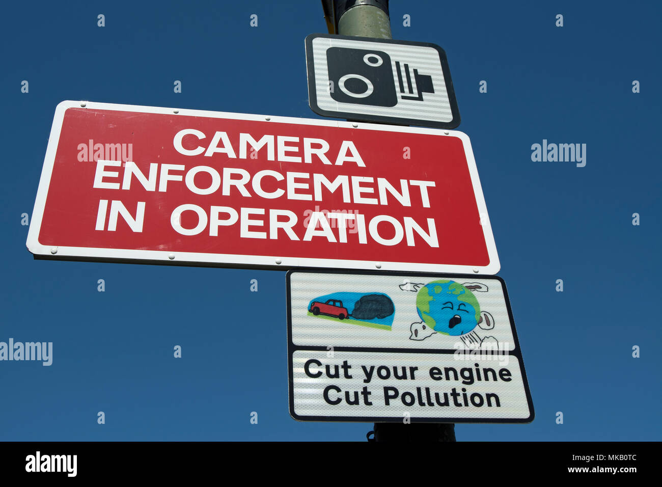 cut your engine cut pollution and camera enforcement signs at a railway ...
