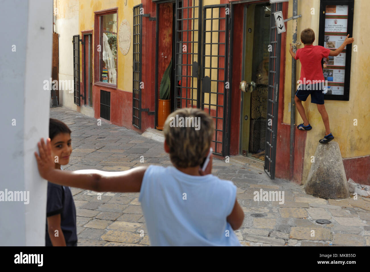 Children playing italy in street hi-res stock photography and images ...
