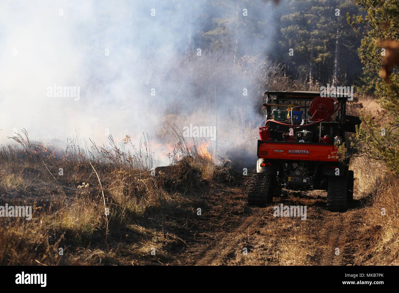 Post personnel oversee a prescribed burn Nov. 30, 2017, at Range 100 on ...
