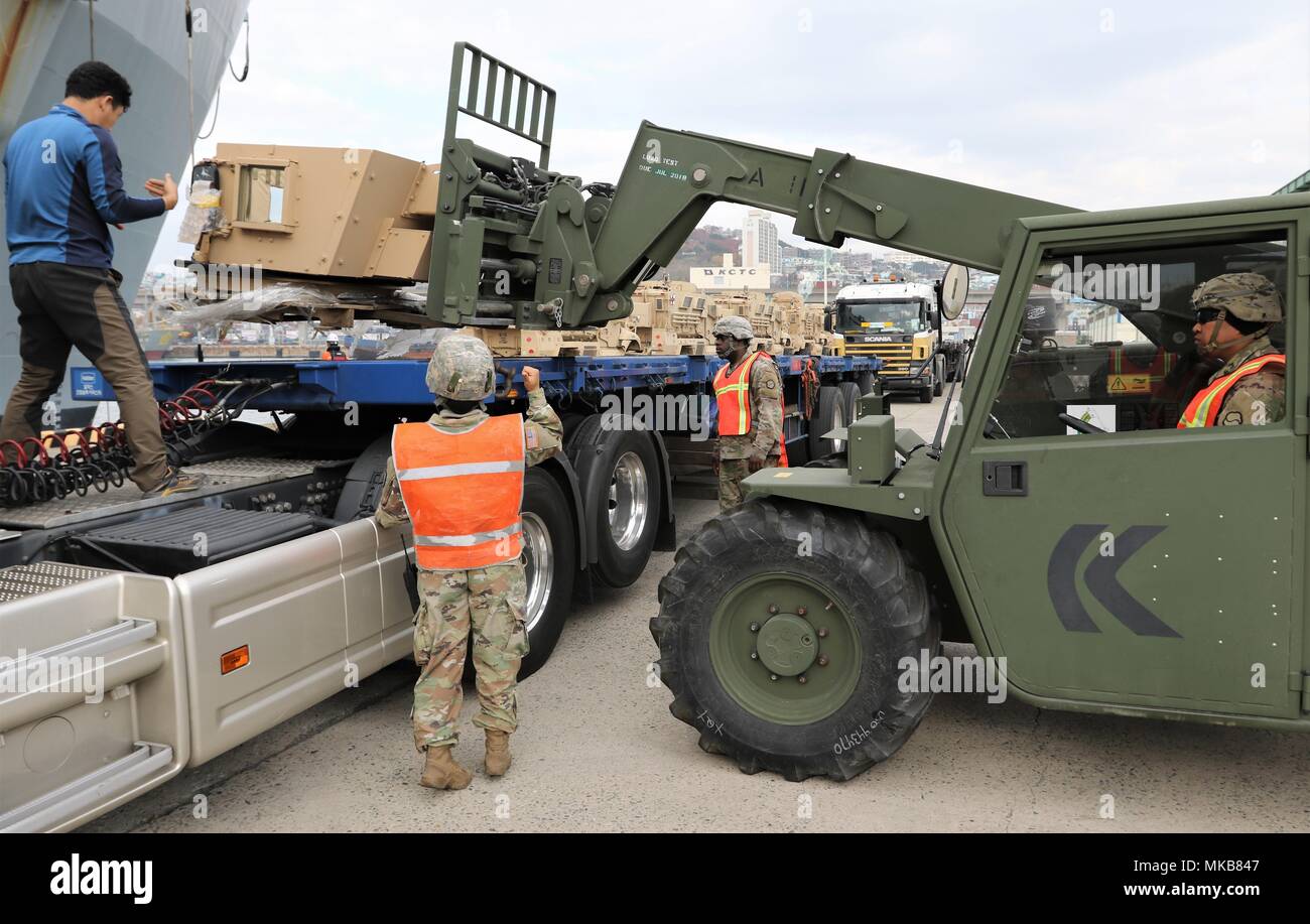 Soldiers with the 551st Inland Cargo Transfer Company, 498th Combat ...