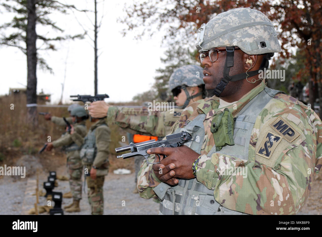 At right, U.S. Army Spc. Zachary Floyd of Warner Robins, Ga., a force ...
