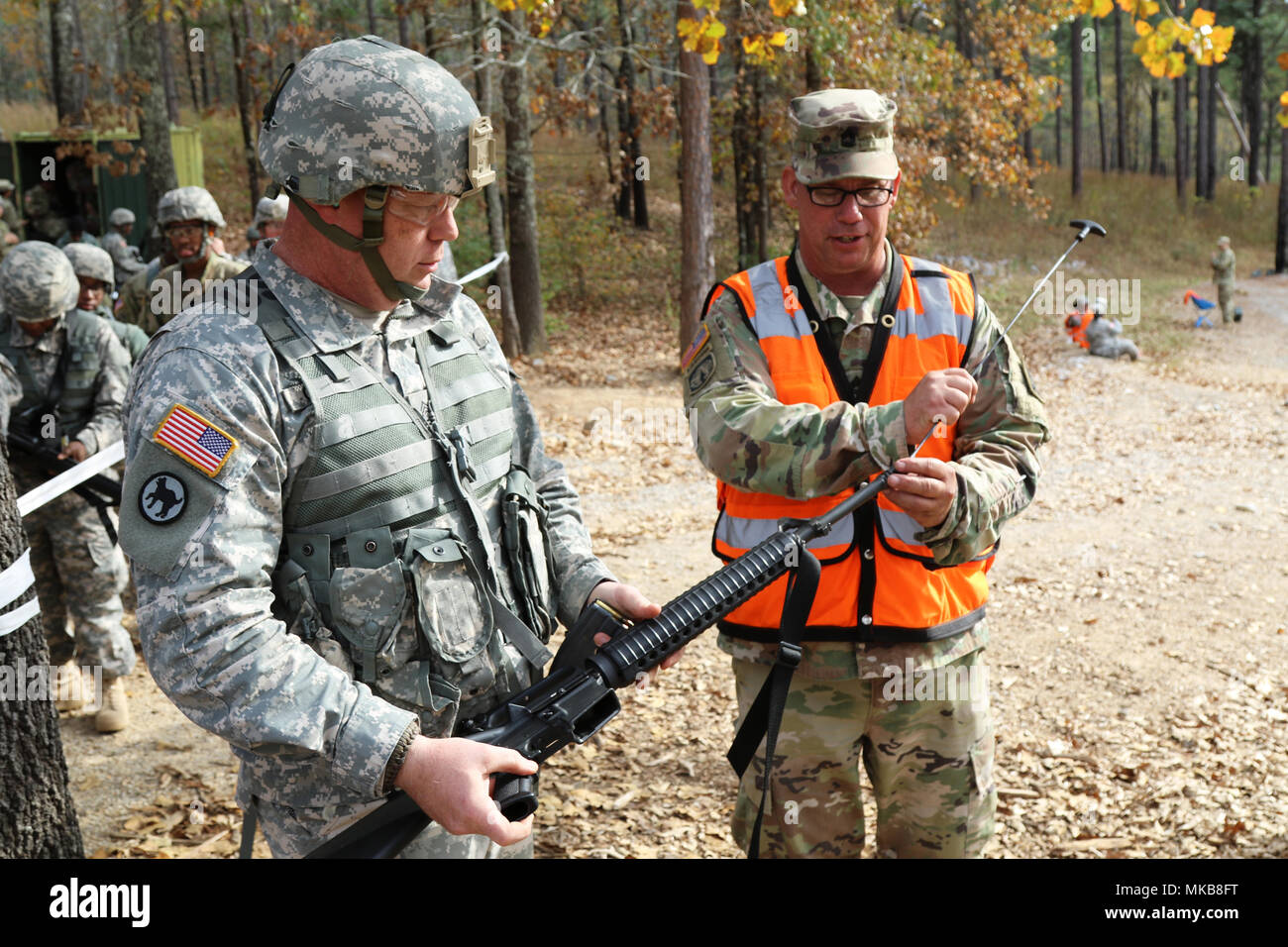 At right, U.S. Army Sgt. 1st Class Forrest Groeneveld of Sebring, Fla ...