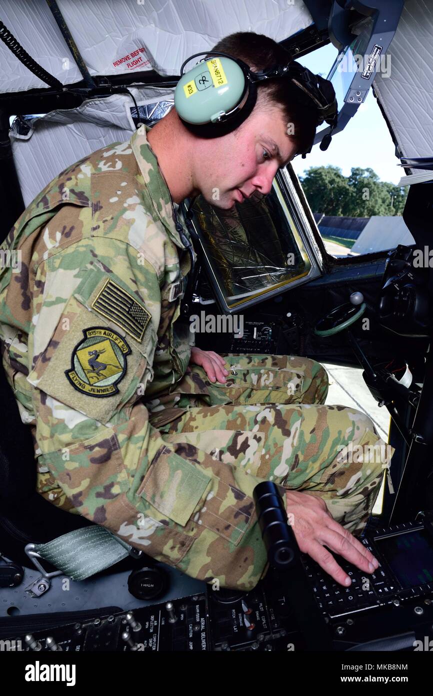 Maj. Jacob McCutcheon, 815th Airlift Squadron pilot, performs a pre ...