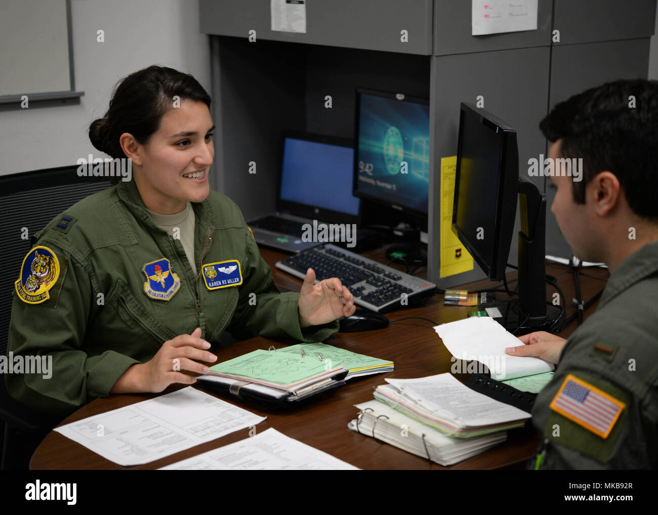 Capt. Karen Miller, 37th Flying Training Squadron instructor pilot, teaches 2nd Lt. Al Vitacco ...