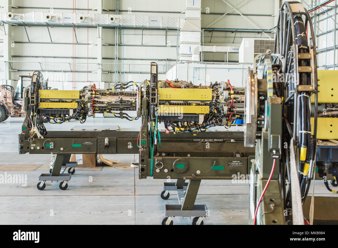 Three conventional rotary launchers wait to be transported and ...