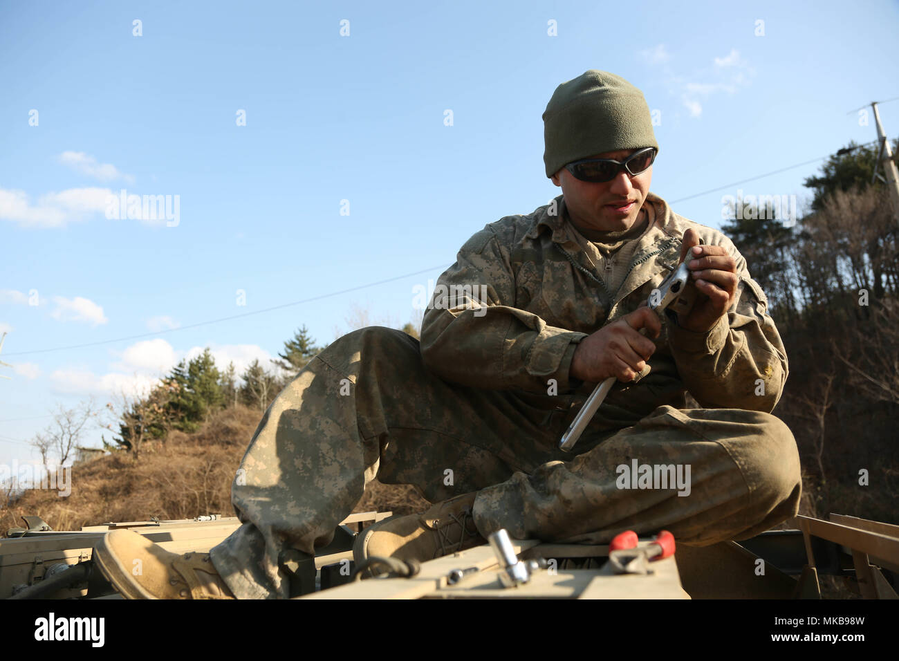 US Army Sgt. Paul Holt, assigned to 2nd Battalion, 4th Field Artillary ...