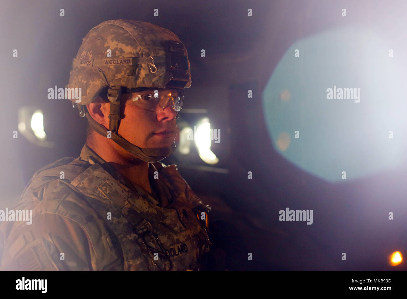 U.S. Army Spc. Christopher Woodland, assigned to 2nd Battalion, 4th ...