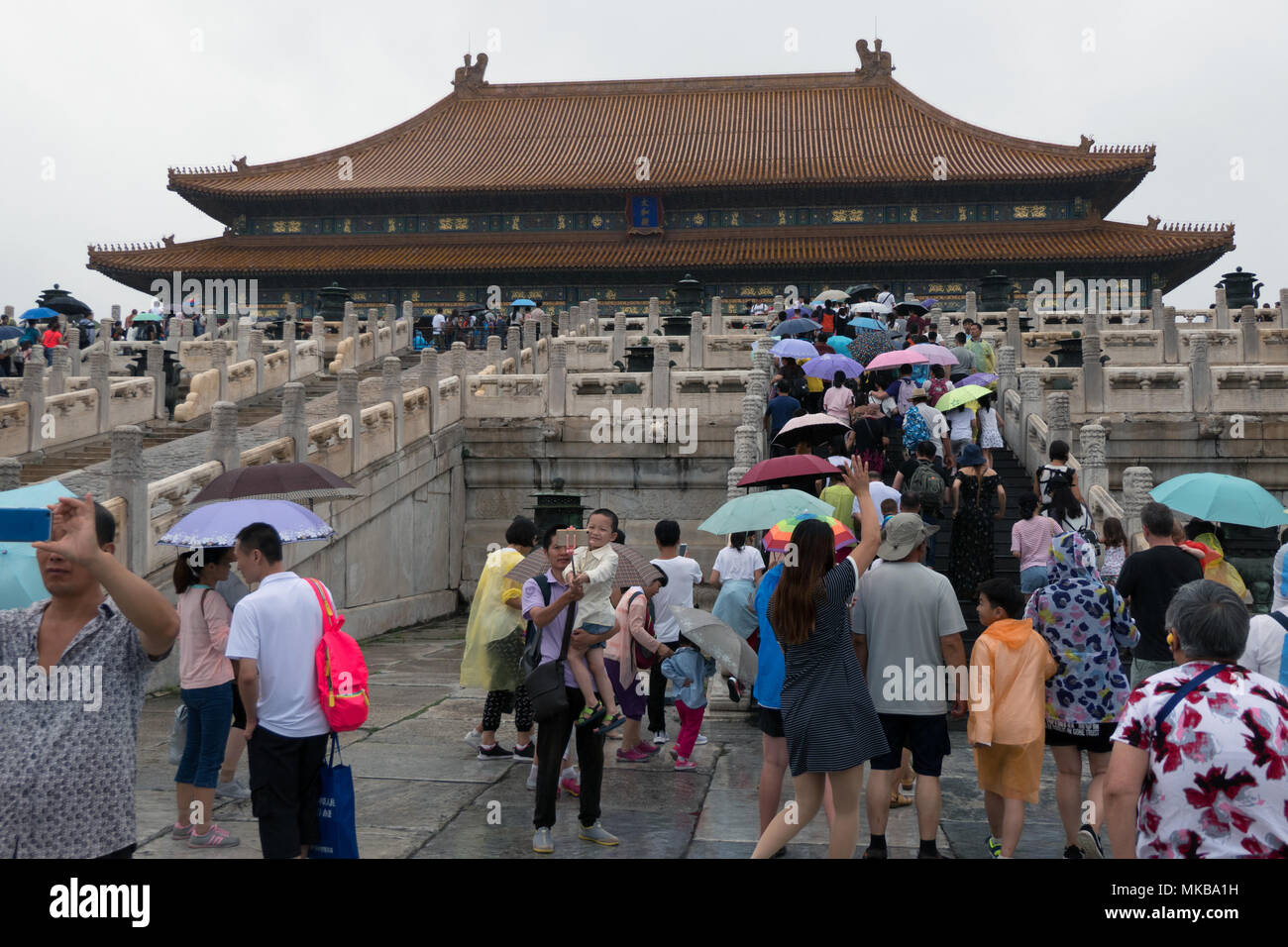 Crowd, people, tourists visiting the Hall of Supreme Harmony within the ...