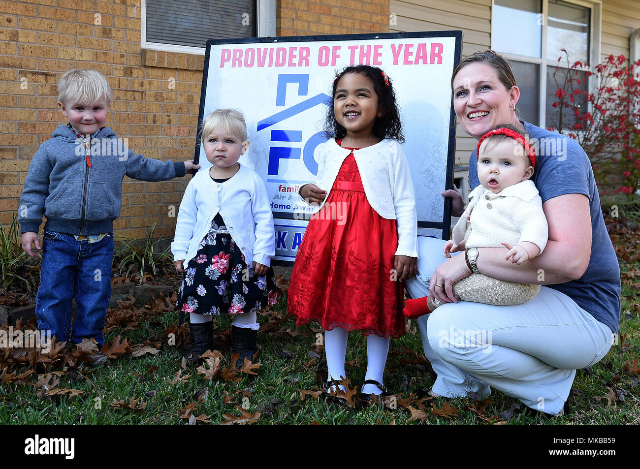 Malissa Kaye, Family Child Care provider, poses for a photo in front of ...