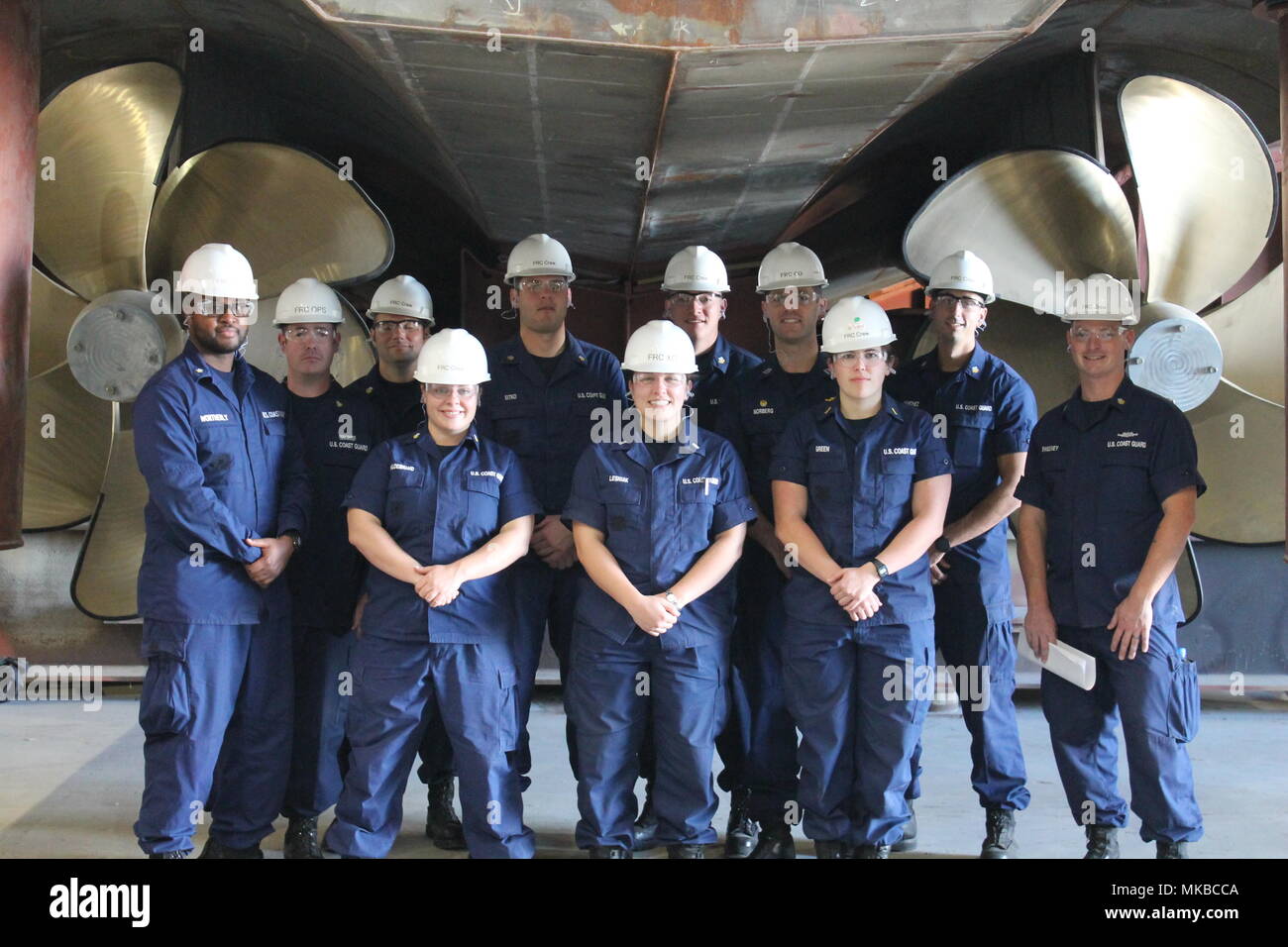 The crew of the Coast Guard Cutter Richard Snyder stands in front of a ...