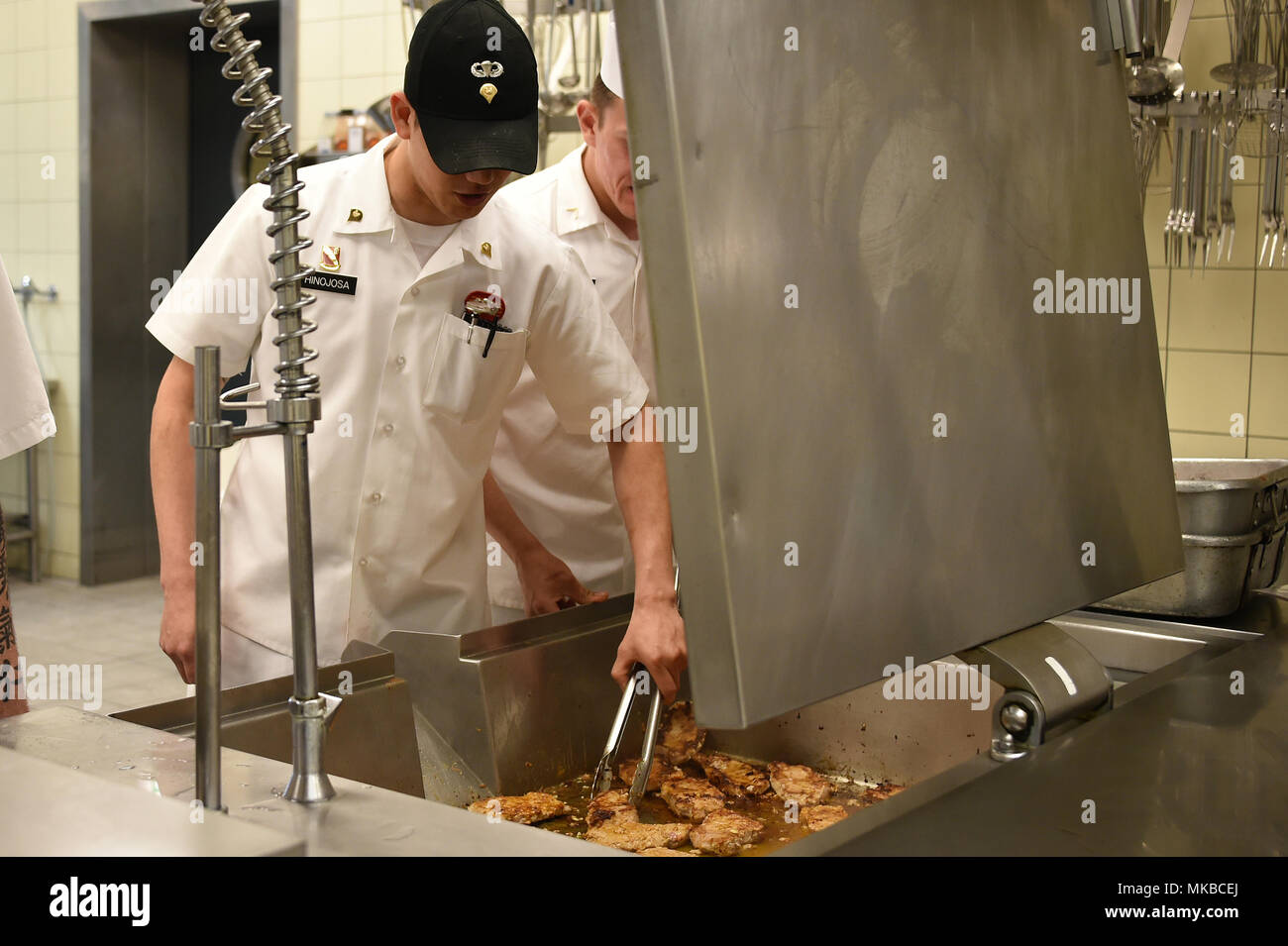 U.S. Army Spc. Arthur Hinojosa, a culinary specialist with Fury Battery ...