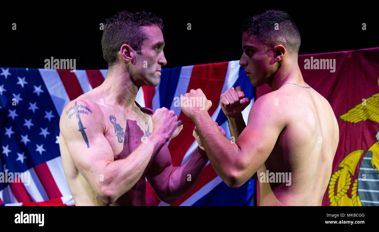 U.S. Marine Corps Cpl. Joshua Vera, right, a water support technician ...