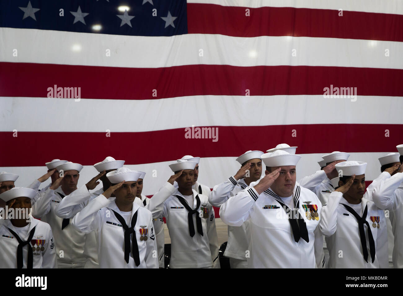 U.S. Sailors salute for the Star-Spangled Banner during the Helicopter ...