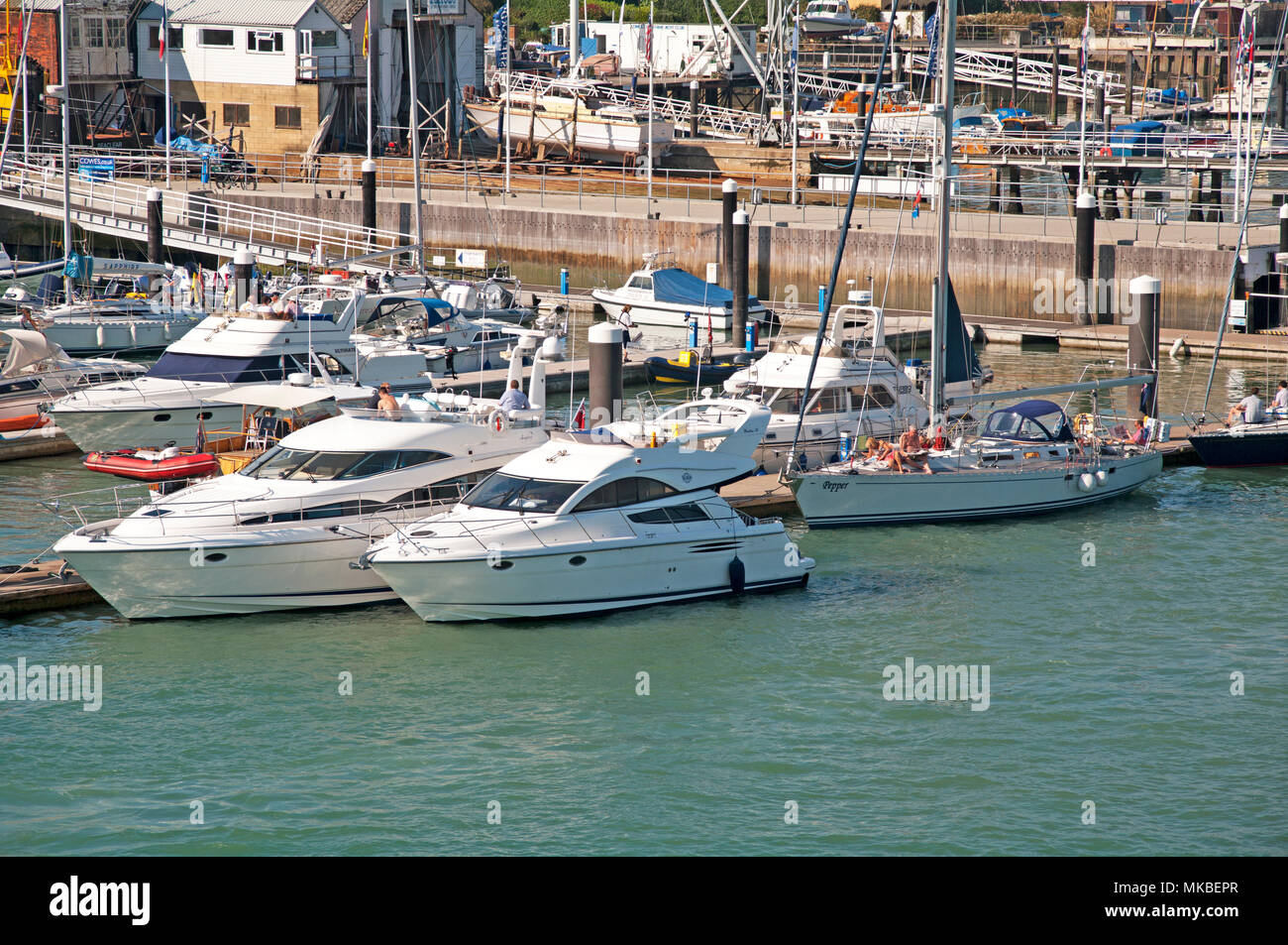 Cows Motor Boats Harbour, Isle of Wight Stock Photo - Alamy