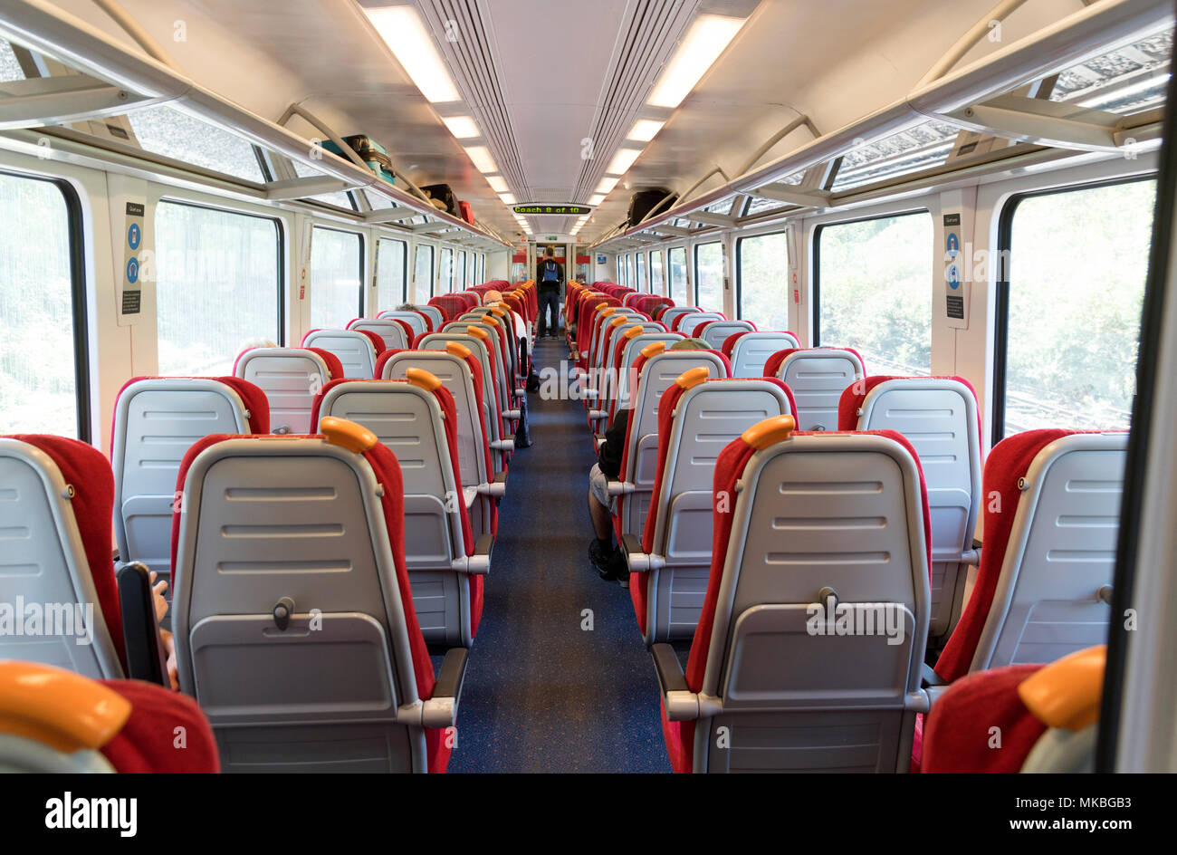 Interior of a passenger railway carriage and line up of seating. 2018 ...
