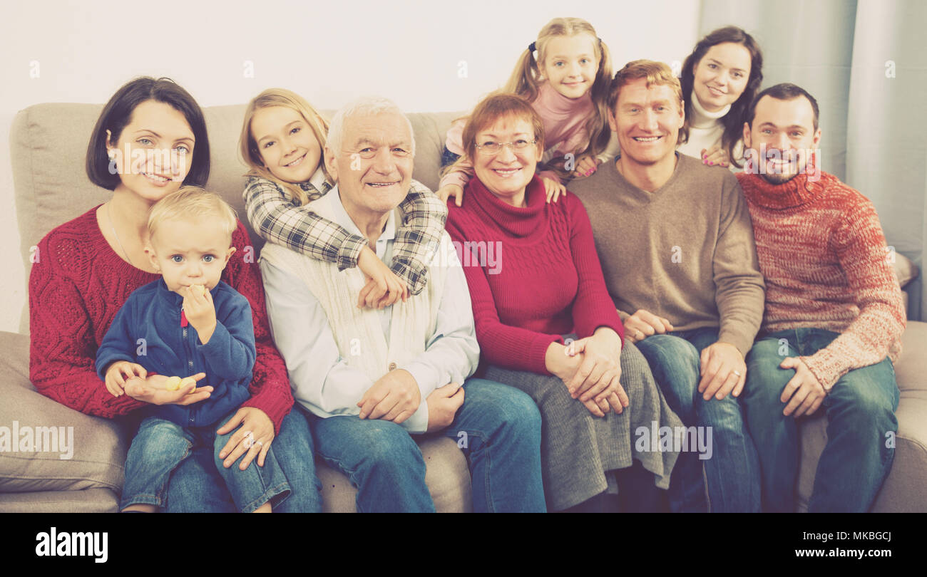 Family members making family photo during reunion party on sofa Stock ...