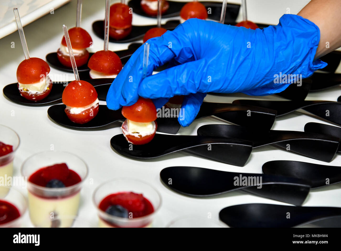 Preparing appetizer hi-res stock photography and images - Alamy
