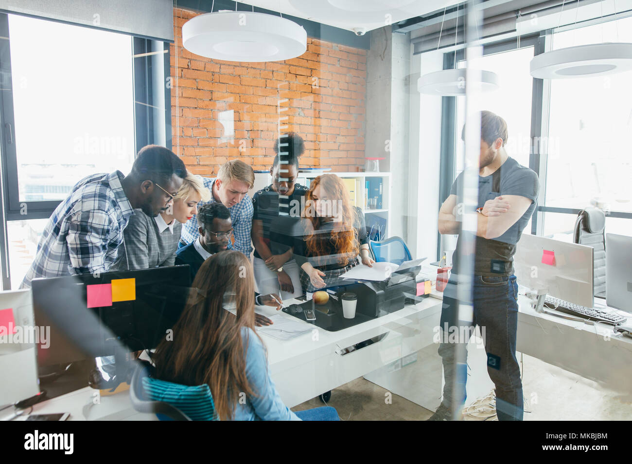 Office Workers Around Table High Resolution Stock Photography and ...