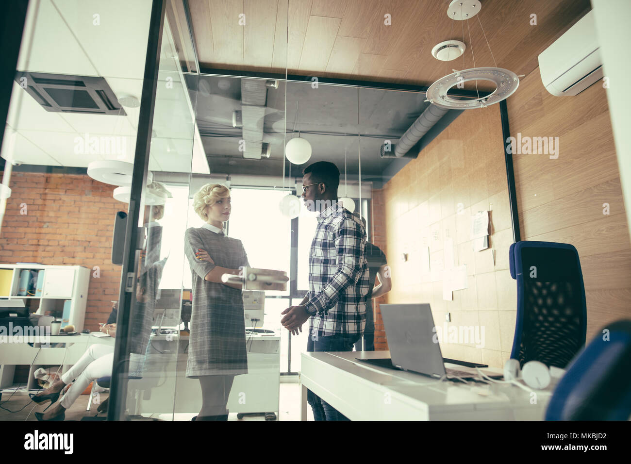 Office women flirt hi-res stock photography and images - Alamy