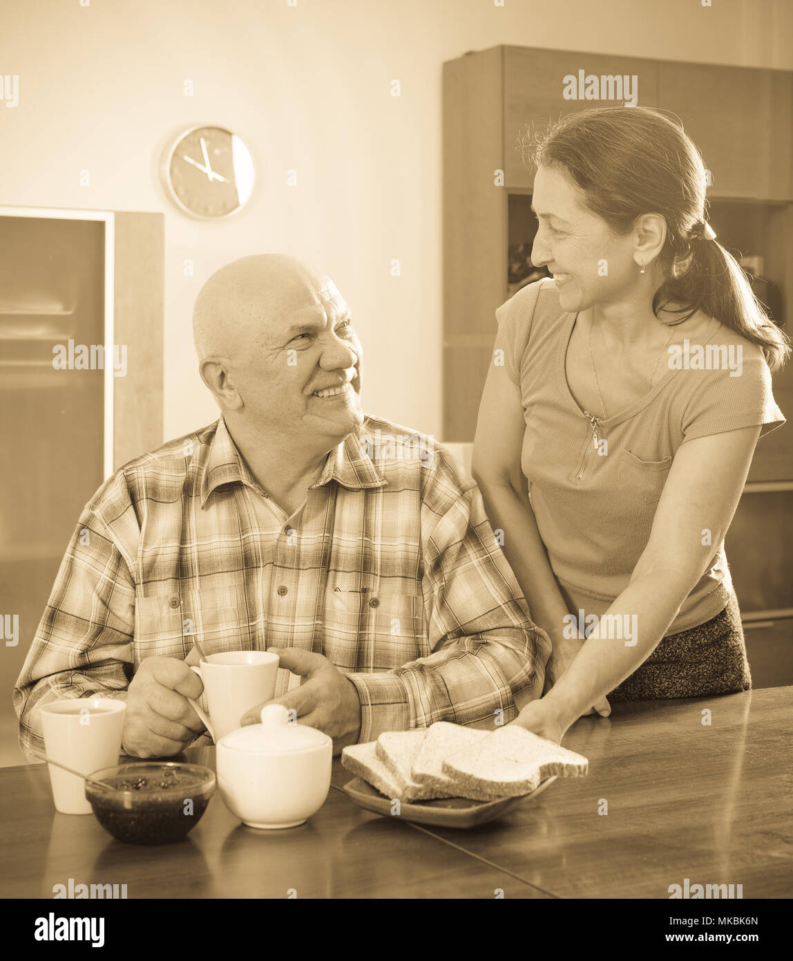 Elderly woman eating toast hi-res stock photography and images - Alamy