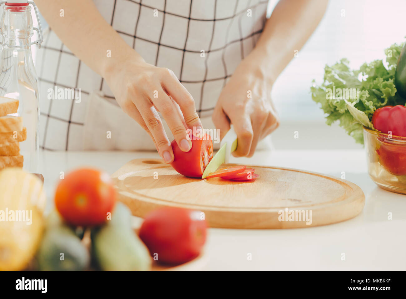 Woman cutting fresh fruit in hi-res stock photography and images - Alamy