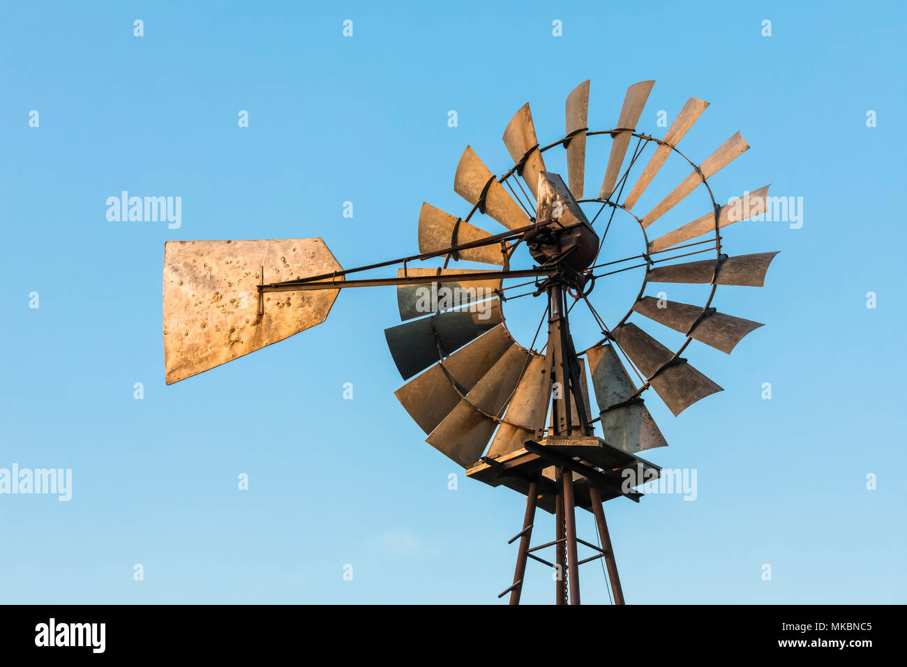 Iconic windmill used for pumping water on grasslands in Nebraska ...
