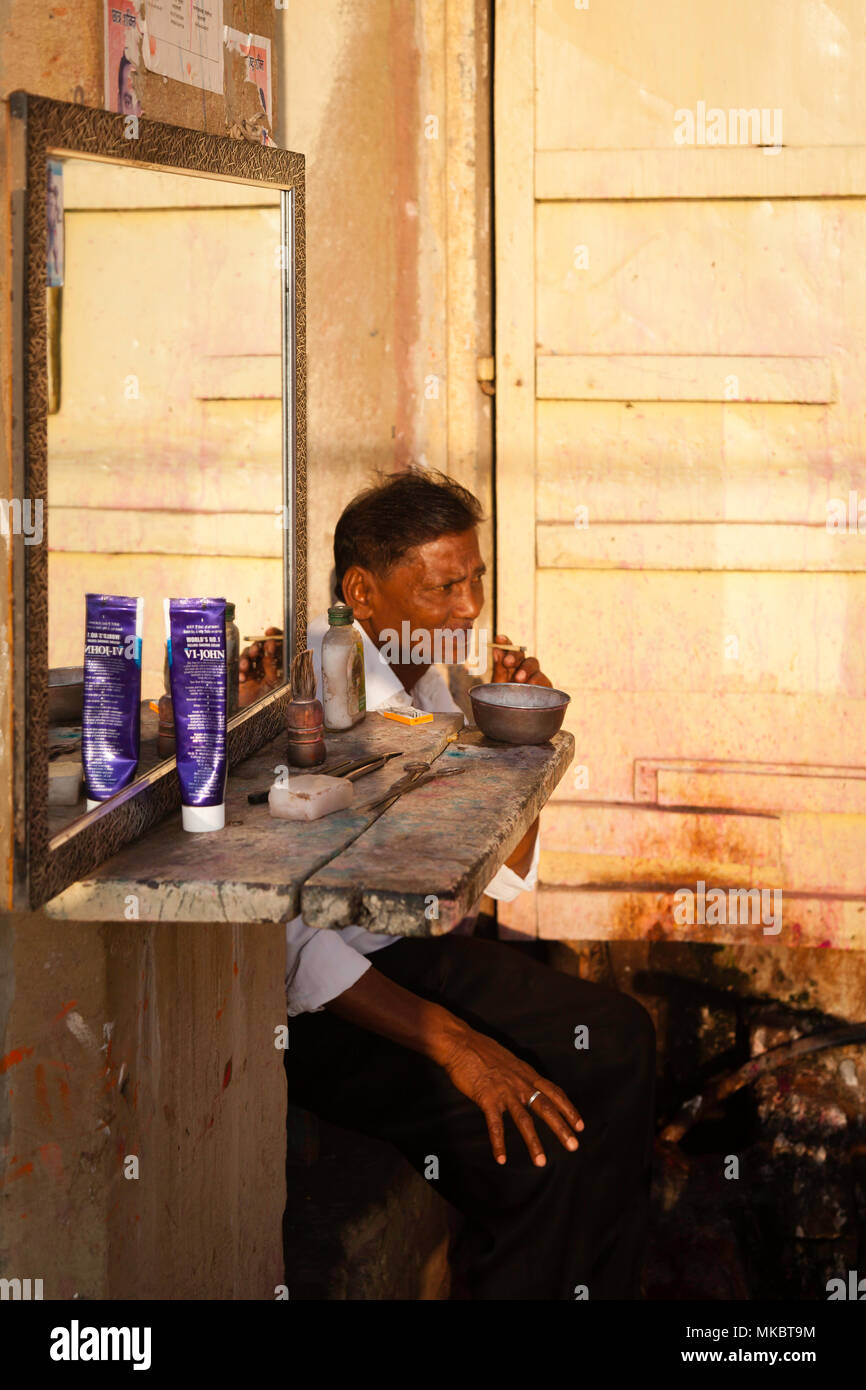 A bespoke barbers table in a barbershop alongside the river Ganges at ...