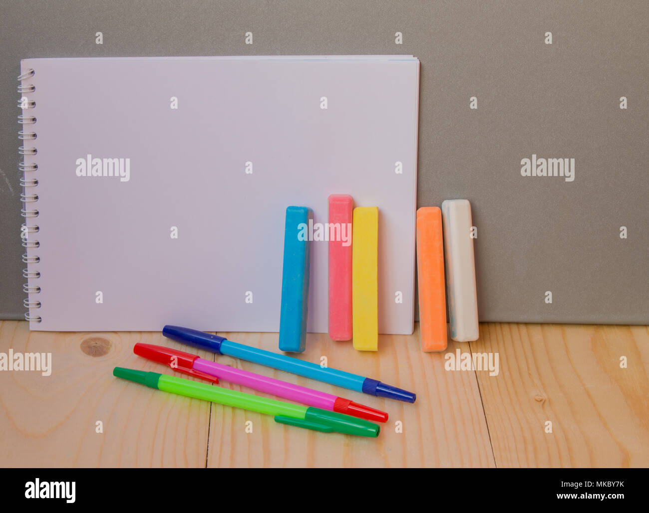 back to school concept, a pen, Notepad chalk Stock Photo - Alamy