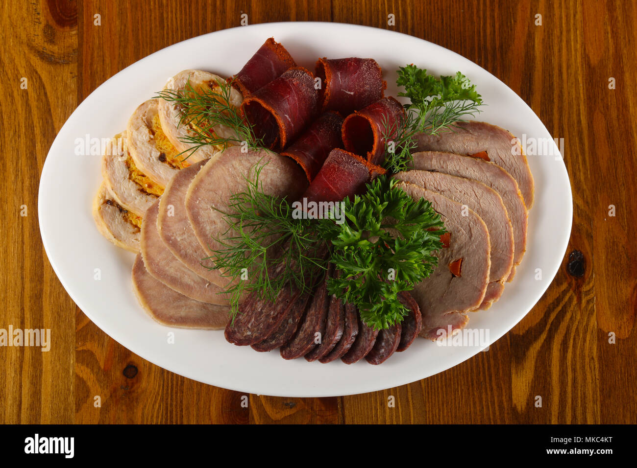 Meat plate - tongue, beef, chicken Stock Photo - Alamy