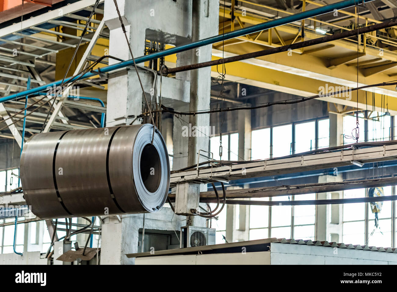 Roll of sheet steel in industrial plant Stock Photo - Alamy