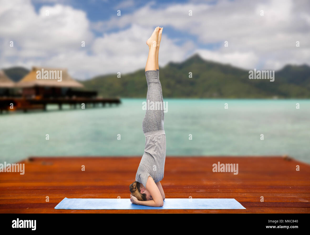 Headstand pose hi-res stock photography and images - Alamy