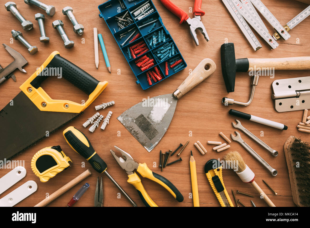 Repairman maintenance and housework project tools on workshop desk, top ...