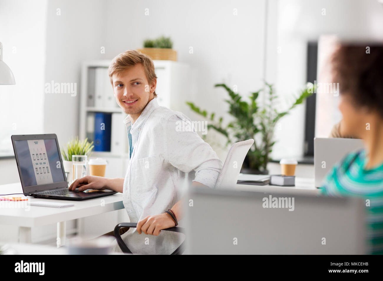 Happy office workers hi-res stock photography and images - Alamy