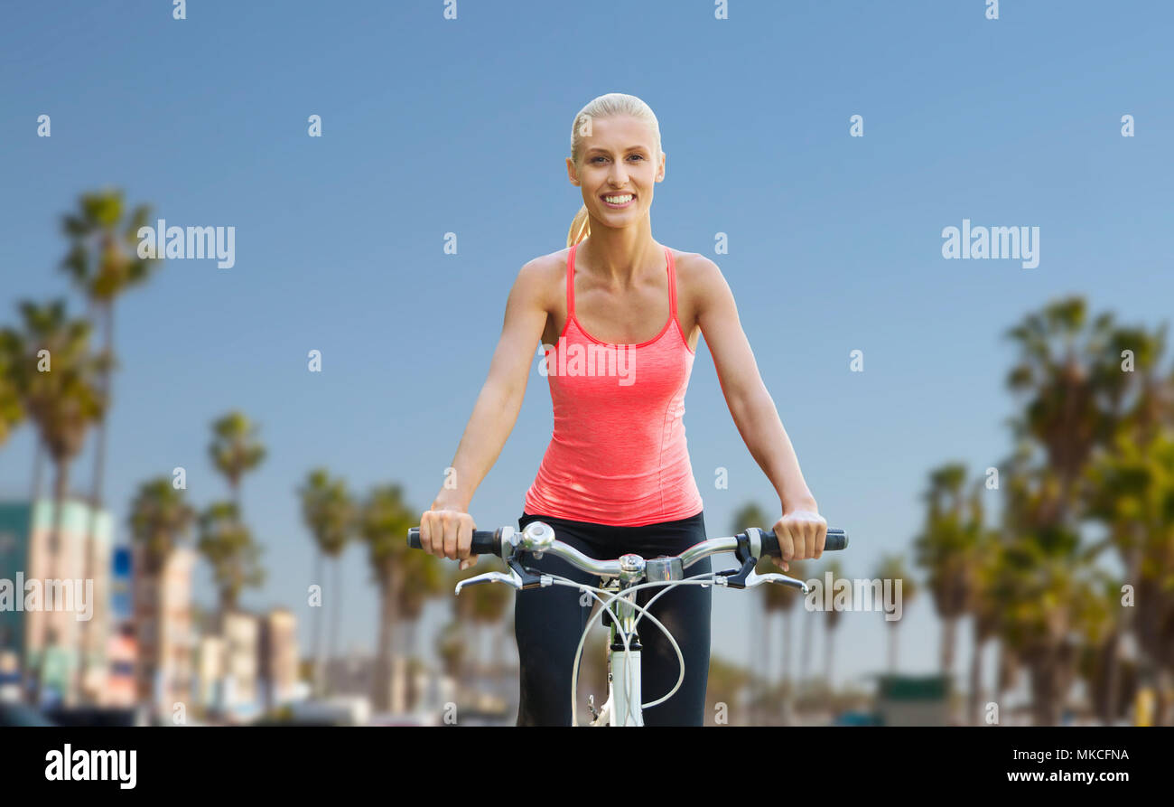 Woman riding bicycle outdoors hi-res stock photography and images - Alamy