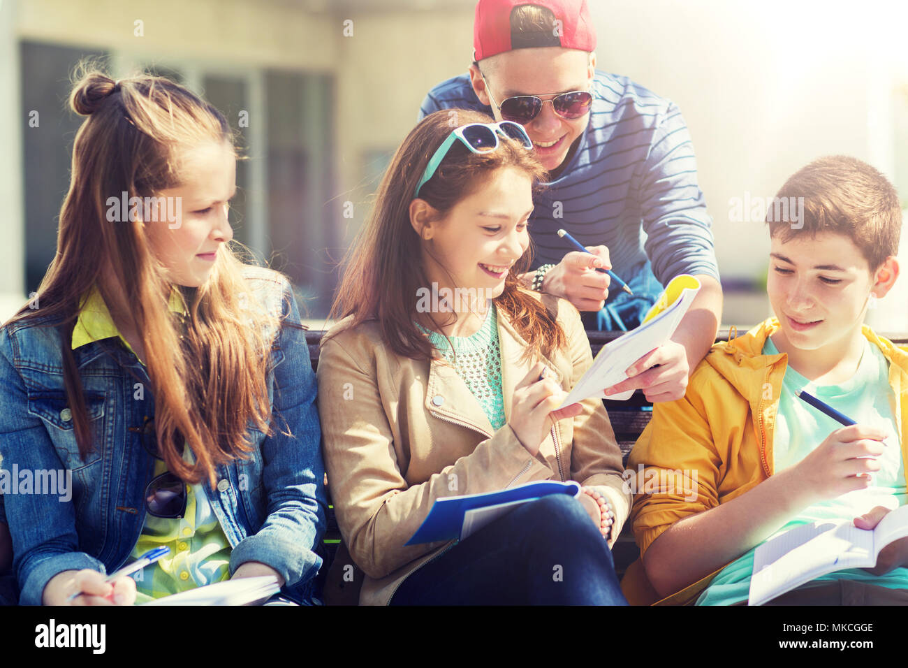 group of students with notebooks at school yard Stock Photo - Alamy