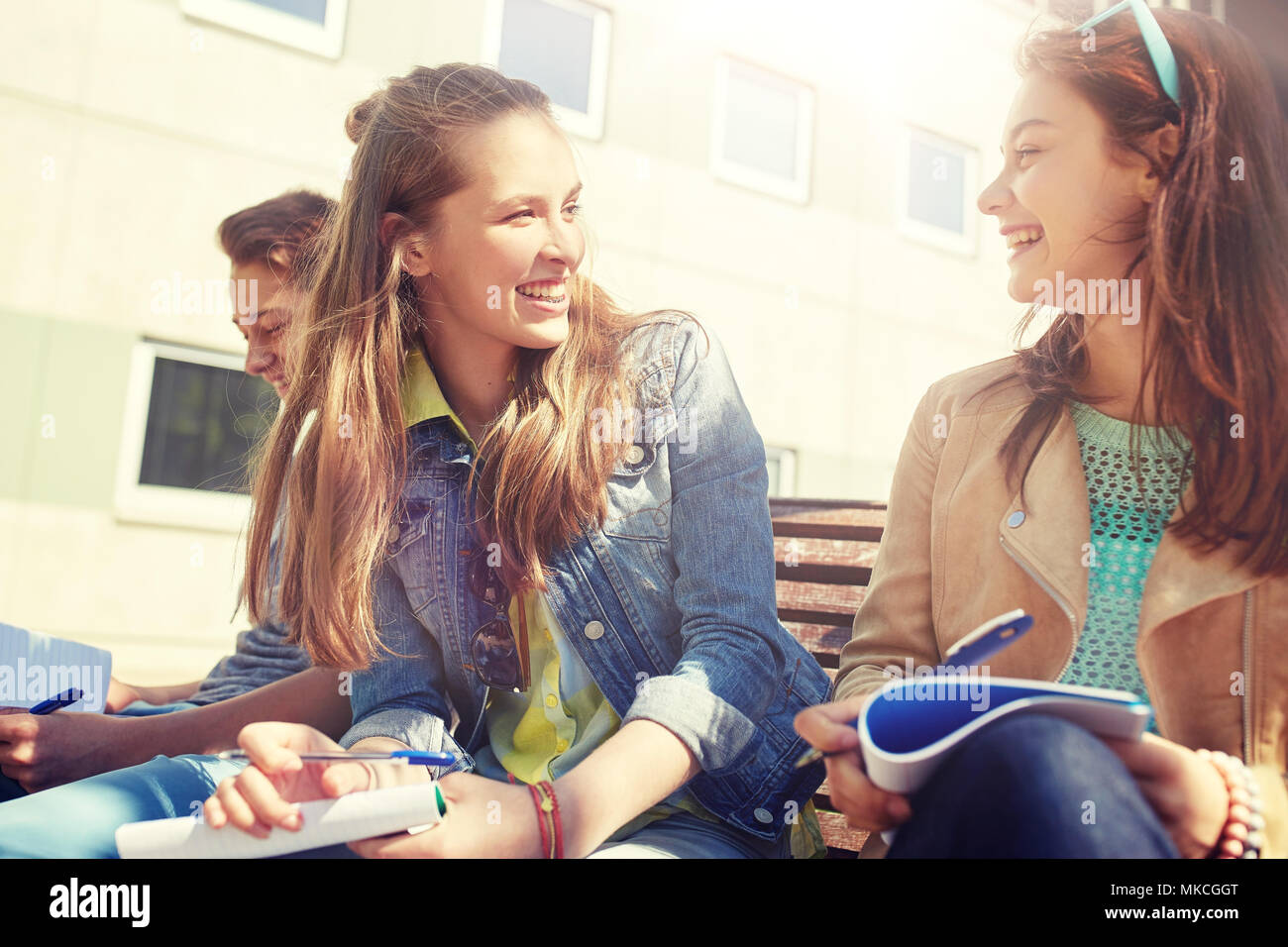 group of students with notebooks at school yard Stock Photo - Alamy