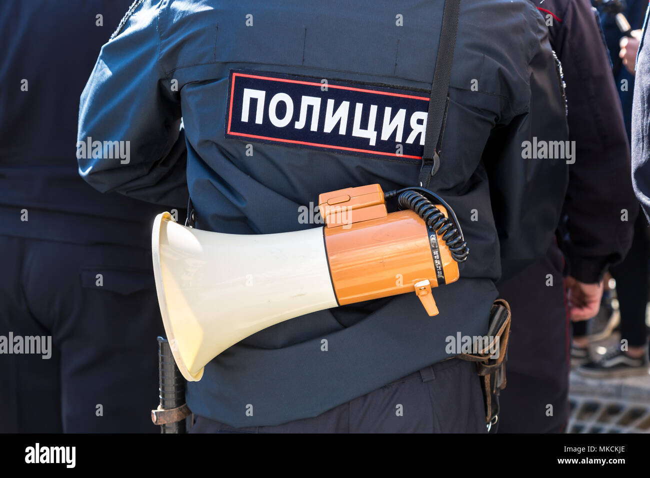 Samara, Russia - May 5, 2018: Russian policeman with megaphone speaker ...