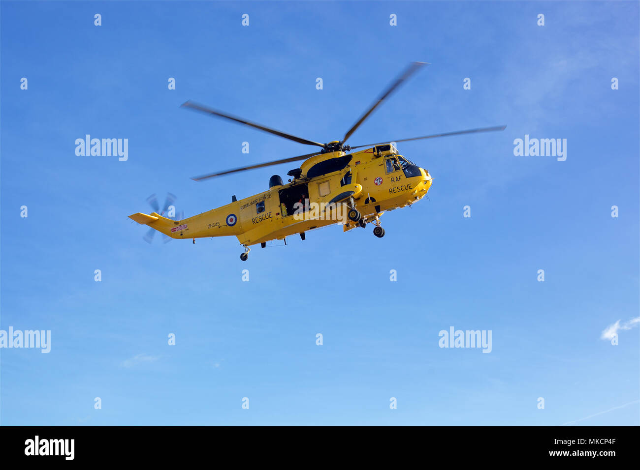 A Westland Sea King RAF Rescue helicopter on manoeuvres on the cliffs at Walton on the Naze ...