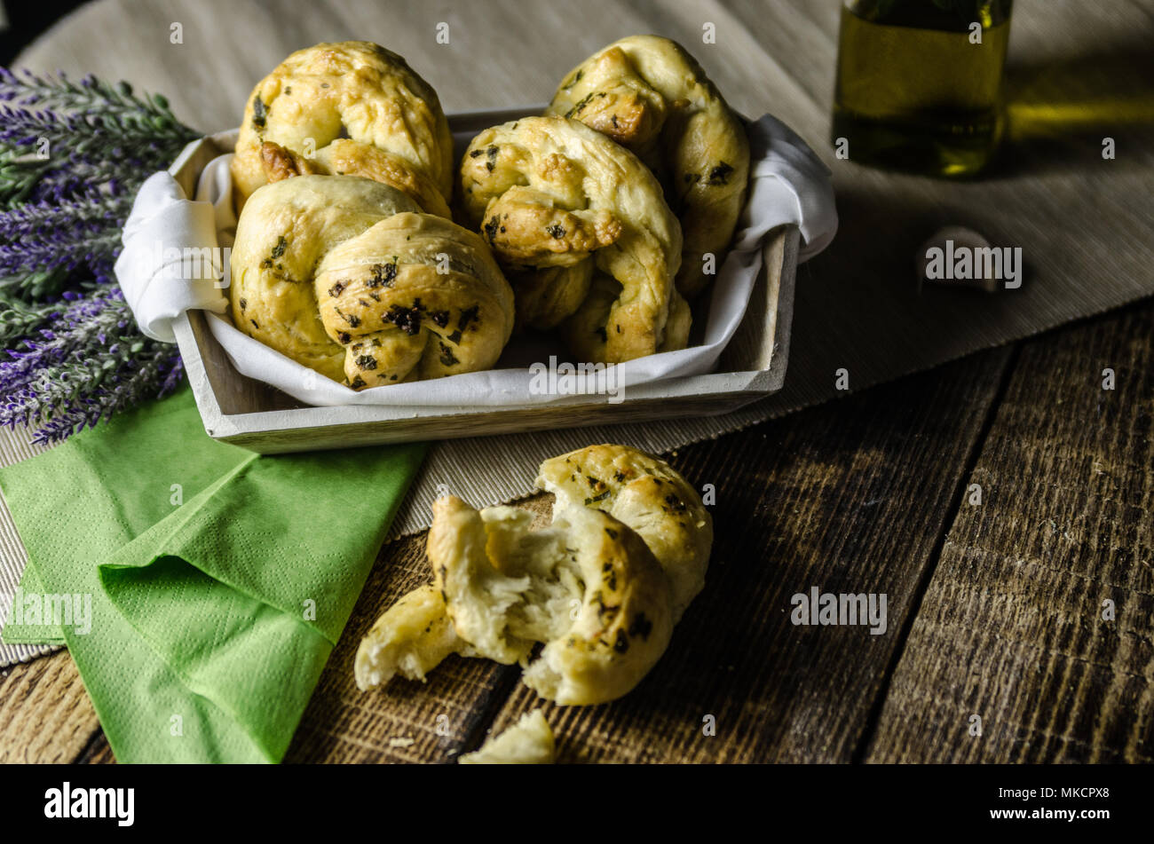 greaves with oil and spices, on a traditional wooden countertop with ...