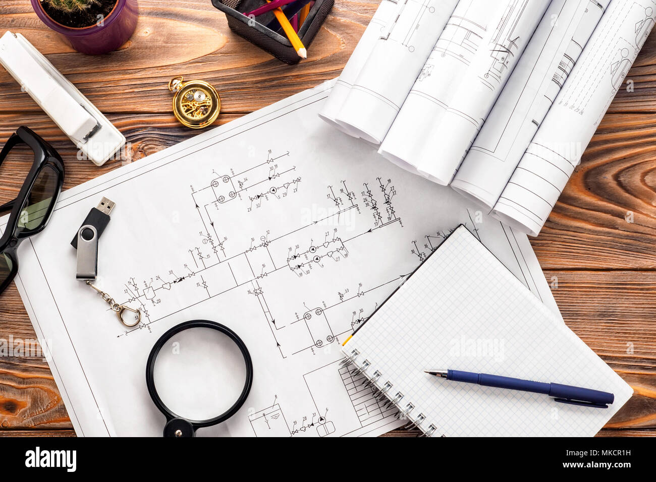 Workplace with blueprint of engineer designer Project notepad with copy ...