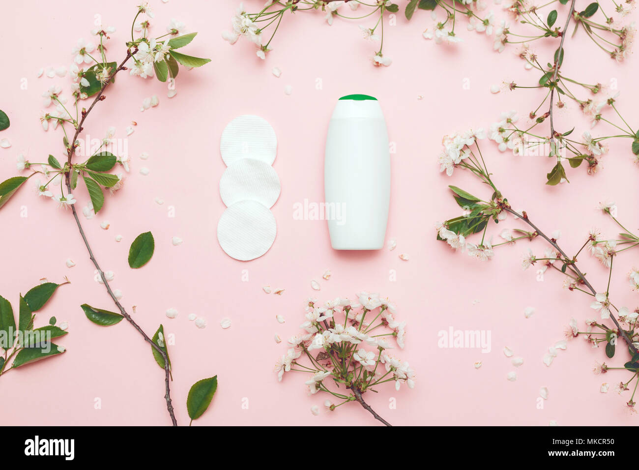 Skin care set on a pink background Stock Photo - Alamy