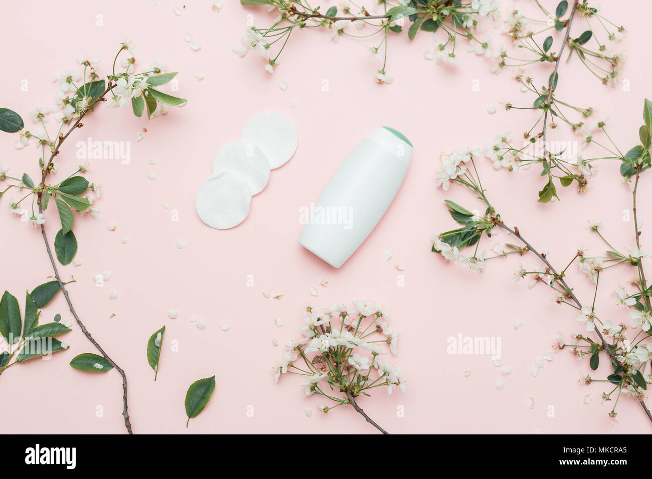 Skin care set on a pink background Stock Photo - Alamy