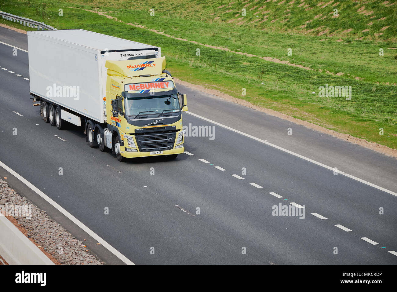 McBurney Volvo delivery trailer and lorry driving along M8 Glasgow ...