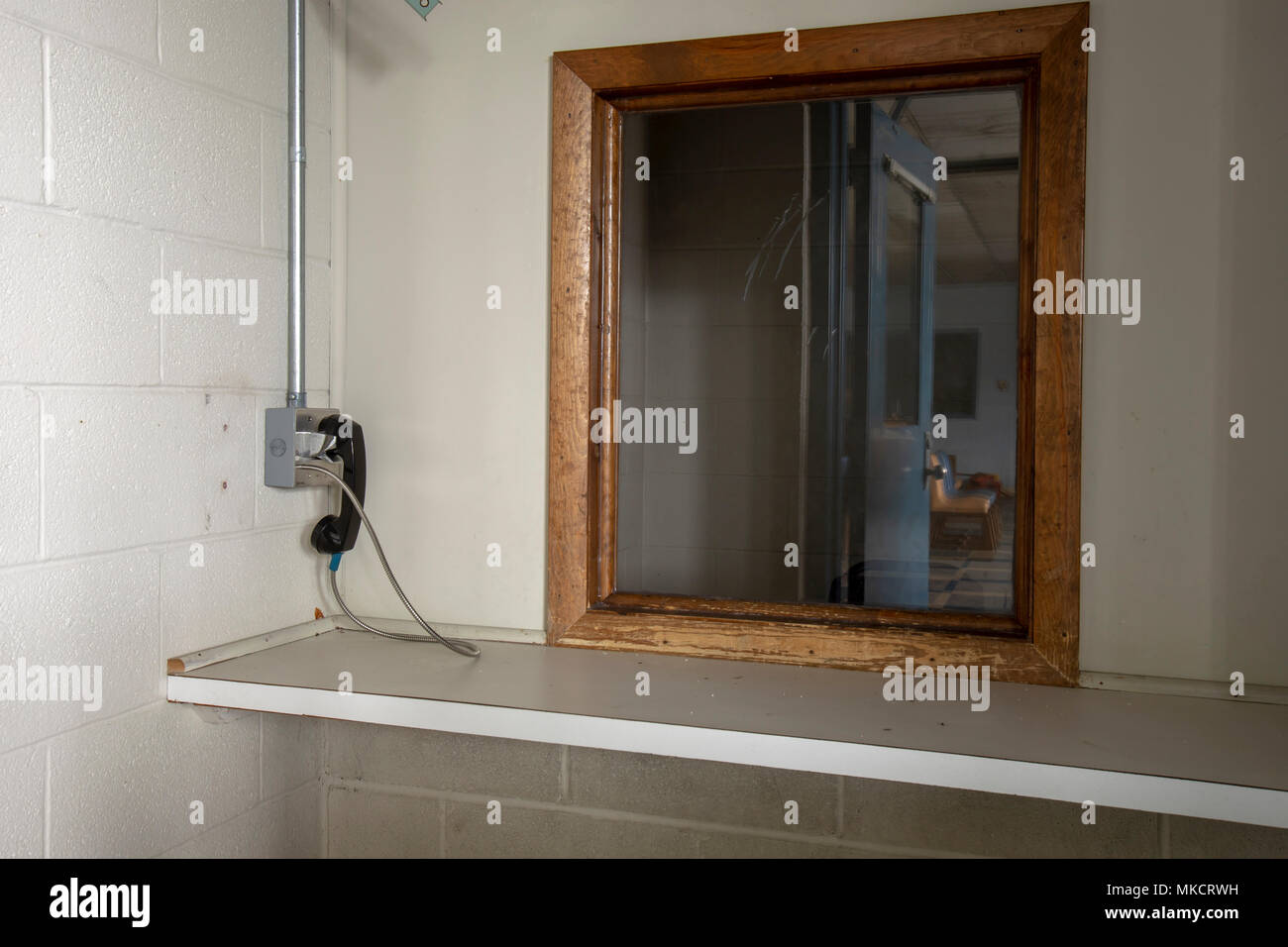 Phone next to window used by visitors to prison to communicate with ...