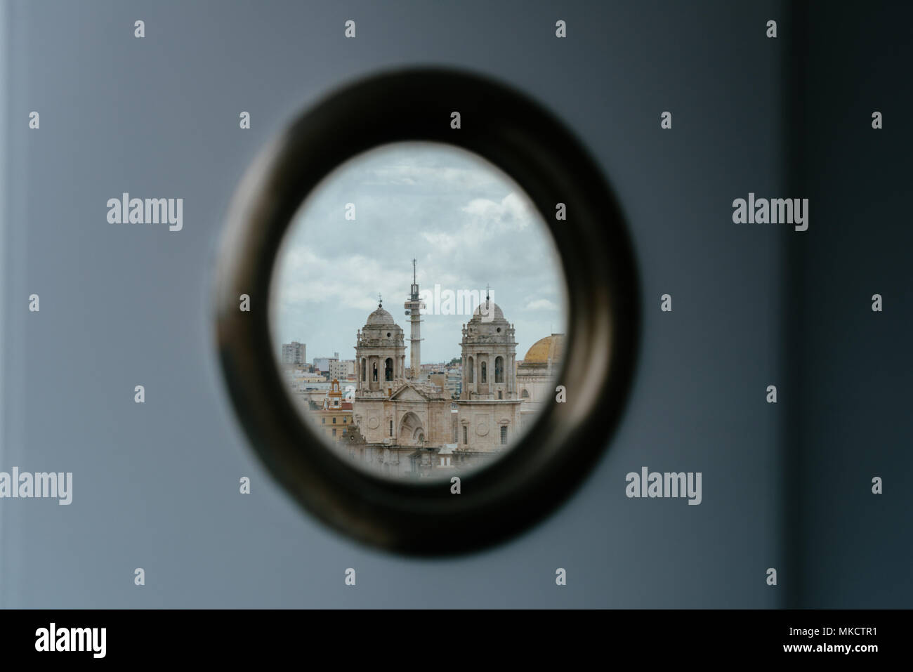 Cathedral of Cadiz through a door in the Tavira tower Stock Photo - Alamy