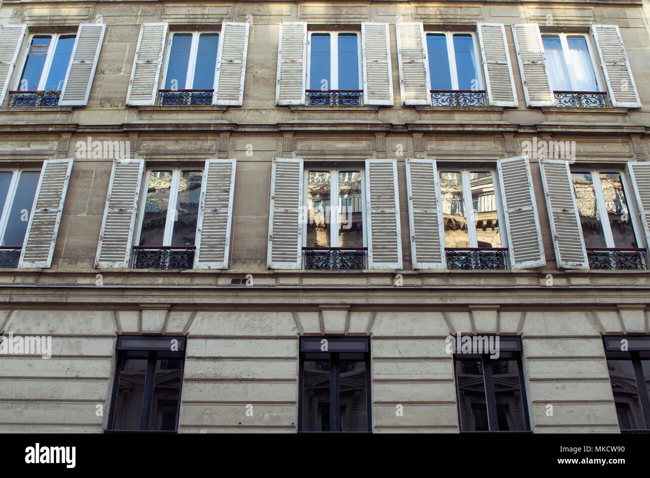 Bottom view of a building in Paris showing French / Parisian ...