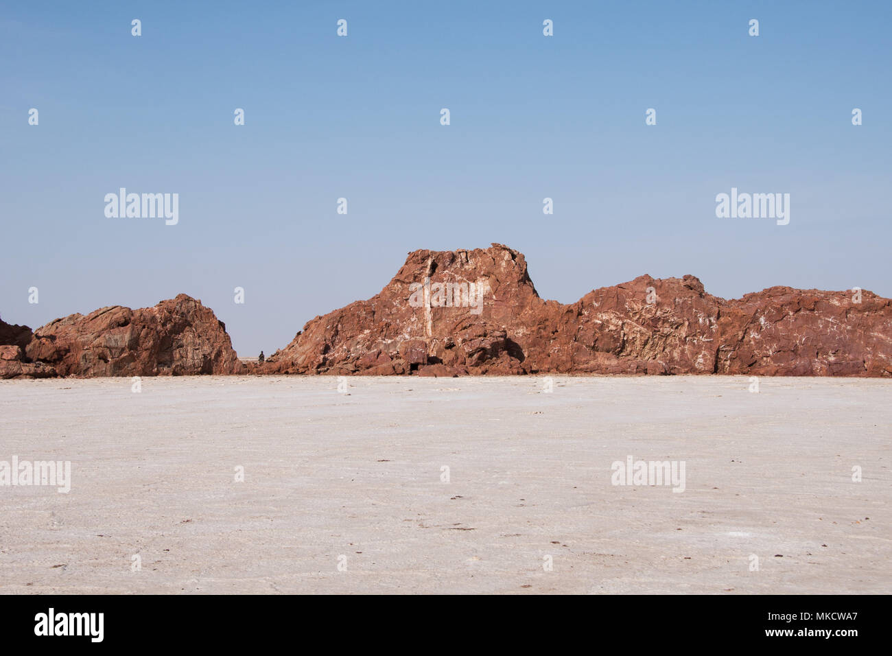 White soils of solonchaks and pink cliffs in the valley of Danakil in ...