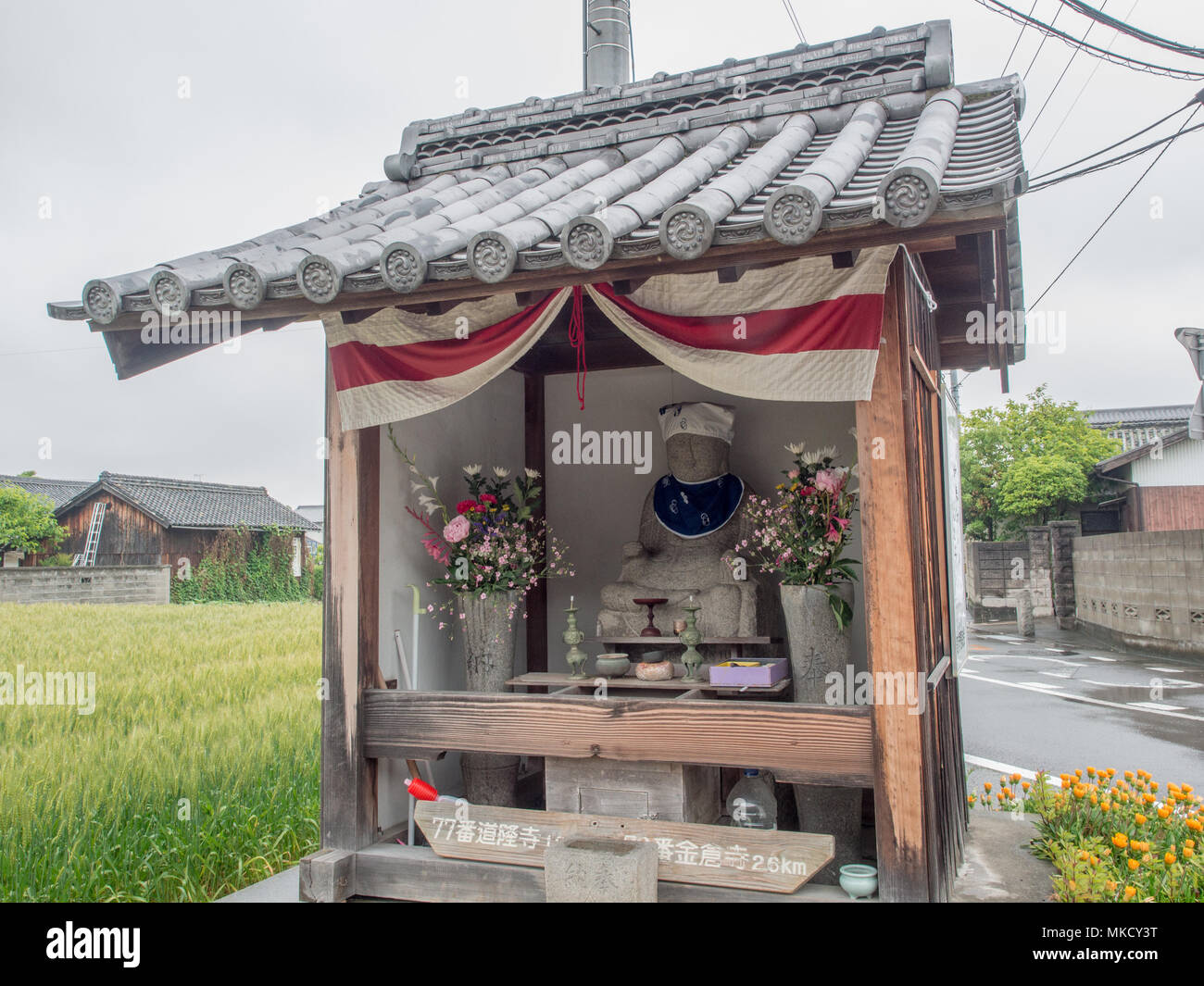 Roadside buddhist shrine on 88 temple pilgrimage trail near Kozonji ...